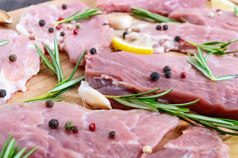 Raw Flat Meat for Steak Chop with Spices on a Cutting Board. Stock ...