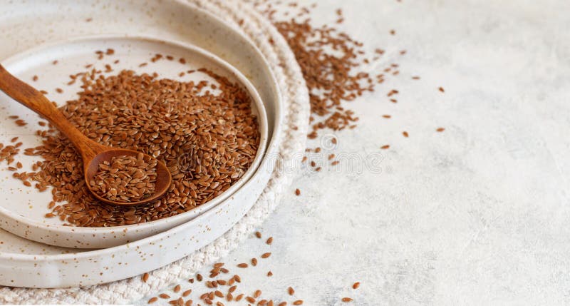 Raw Flax Seeds in a Plate with a Spoon Stock Image - Image of table ...