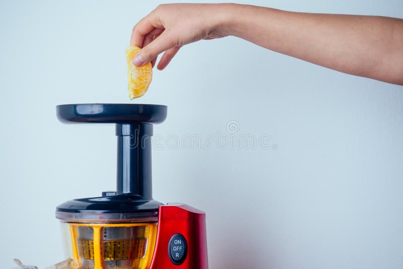 Raw Food Diet Concept Oranges and Juicemachine in White Background ...