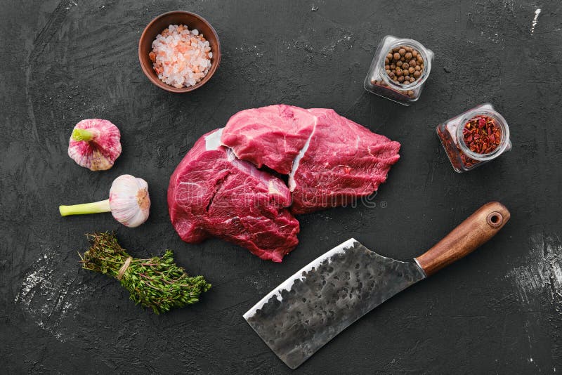 Raw Fresh Beef Chuck Eye Roast on Black Stock Photo - Image of blood ...