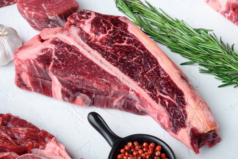 Raw Fresh Beef T Bone Steak, on White Stone Background Stock Image ...
