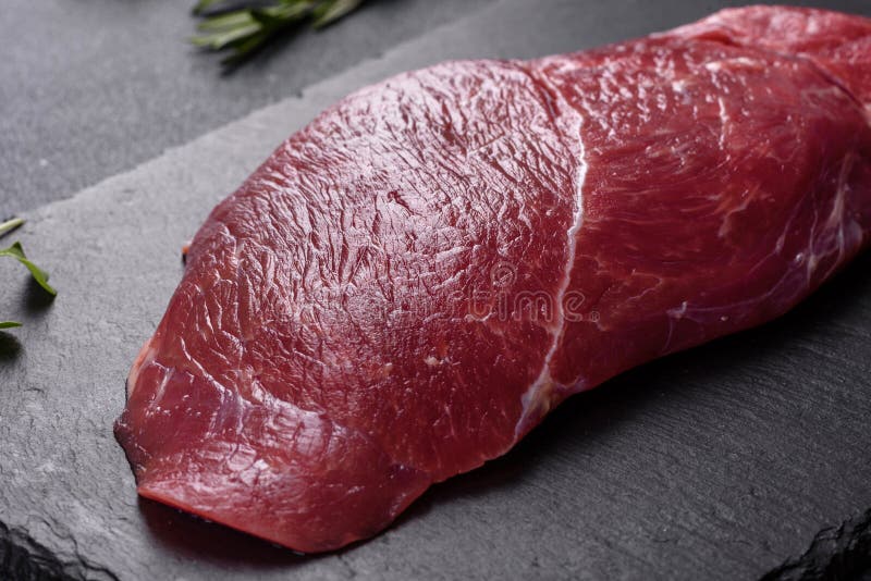 Raw Fresh Chuck Roll Steak with Herbs and Salt on a Cutting Board Stock ...