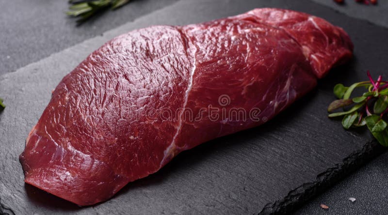 Raw Fresh Chuck Roll Steak with Herbs and Salt on a Cutting Board Stock ...