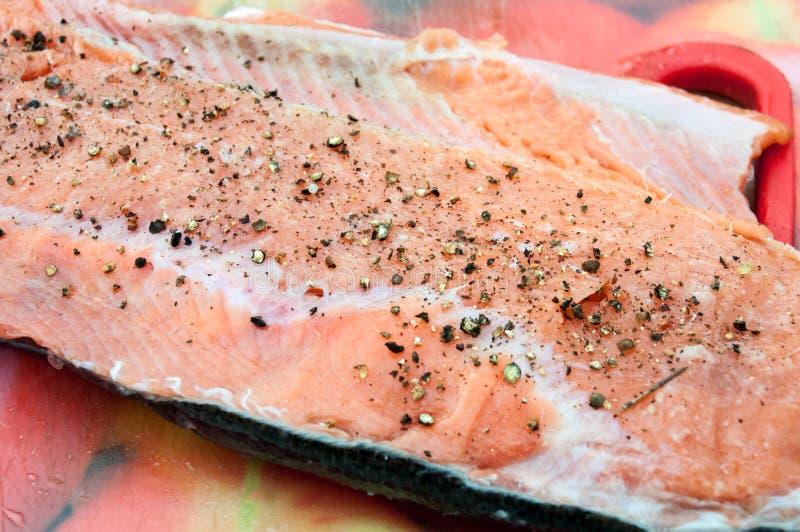 Raw Fresh Fillet of Red Fish Sprinkled Black Pepper Stock Image - Image ...