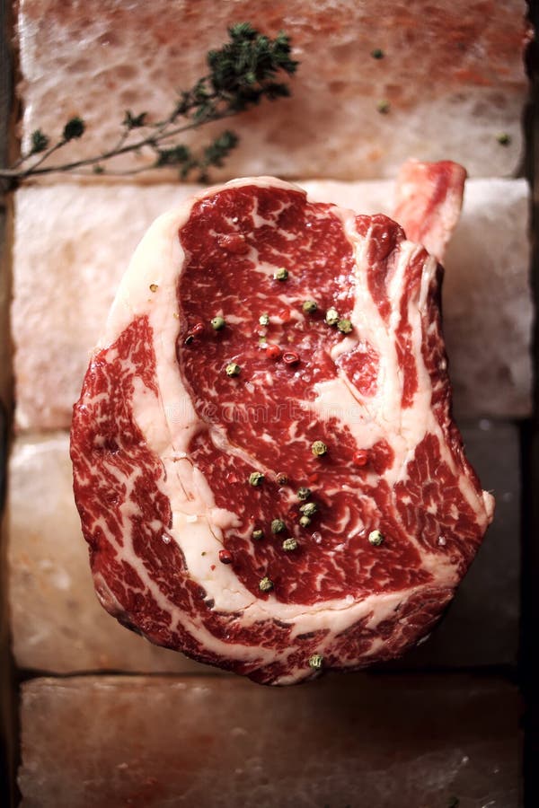 Raw fresh marbled beef stock photo. Image of spices, beef - 53990644
