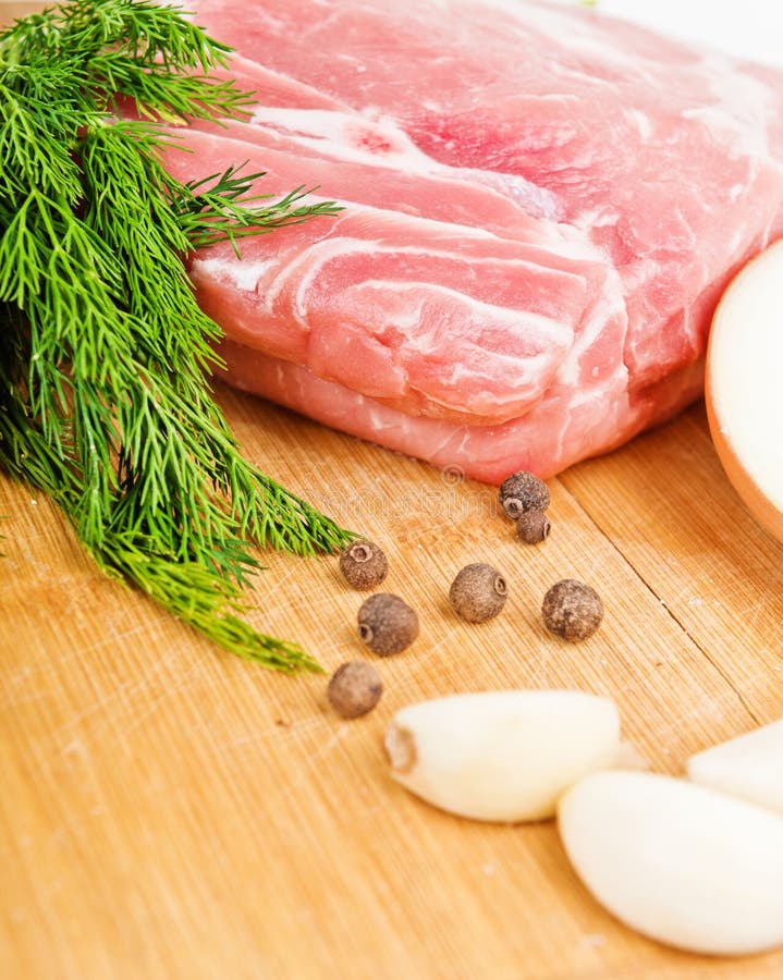 Raw Fresh Meat on Board with Condiments Stock Photo - Image of board ...