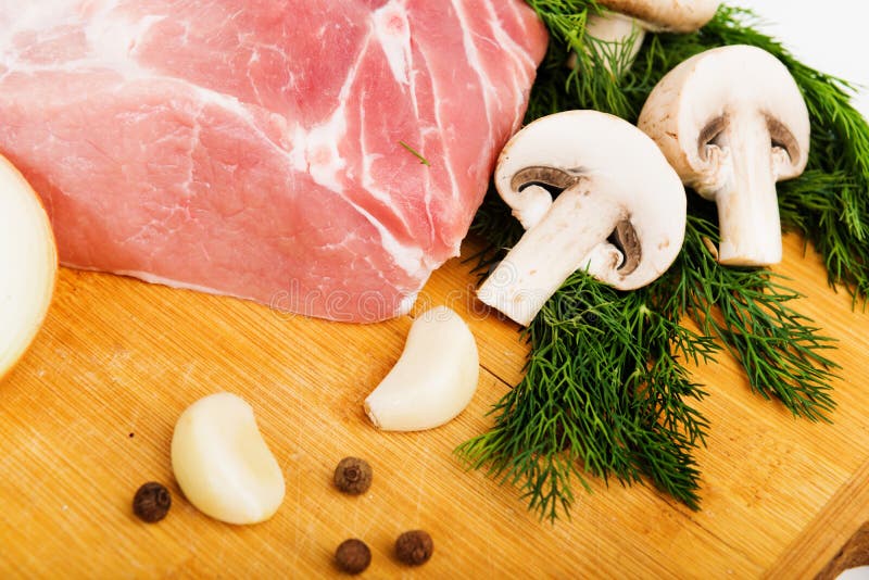 Raw Meat on Board with Condiments Stock Photo - Image of board, juicy ...