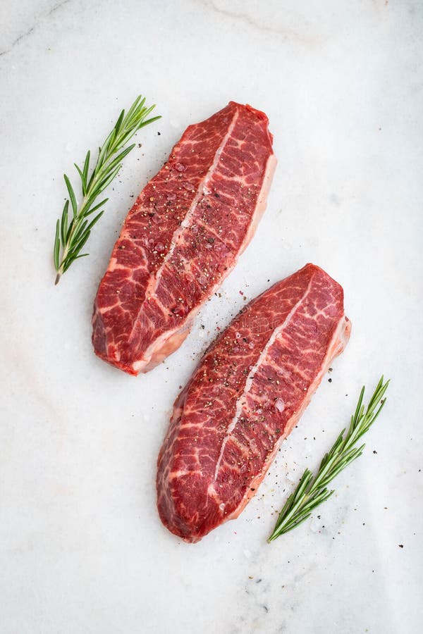 Raw Fresh Meat Top Blade Steaks on Light Background. Top View Stock ...