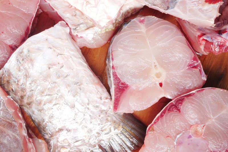 Raw Fresh Sea Fish on Plate on Table , Stock Photo - Image of seafood ...