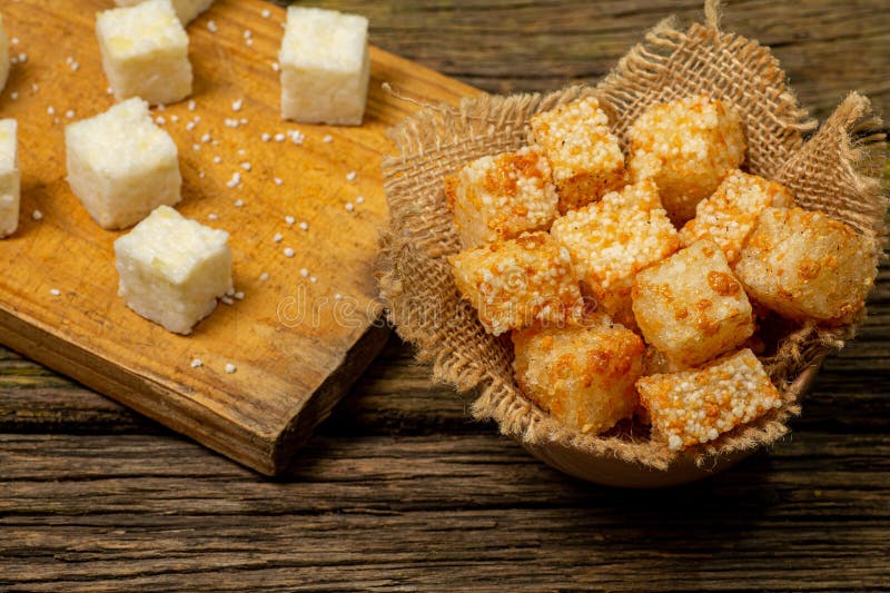 Raw and Fried Tapioca Cubes (Dadinhos De Tapioca) on Top of Rustic ...