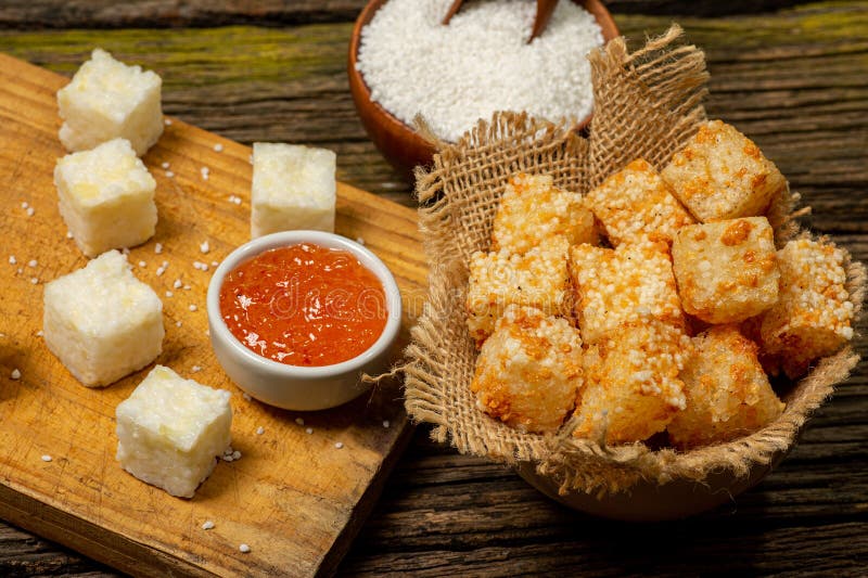 Raw and Fried Tapioca Cubes (Dadinhos De Tapioca) on Top of Rustic ...