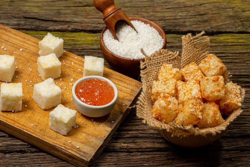 Raw and Fried Tapioca Cubes (Dadinhos De Tapioca) on Top of Rustic ...