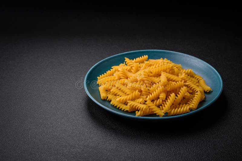 Raw Fusilli Pasta from Whole Grain Wheat Varieties Stock Photo - Image ... Raw Fusilli Pasta from Whole Grain Wheat Varieties Stock Photo - Image ...