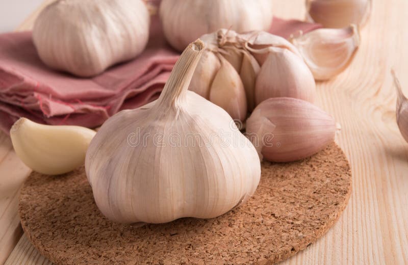Raw garlic stock photo. Image of board, healthy, food - 68770496
