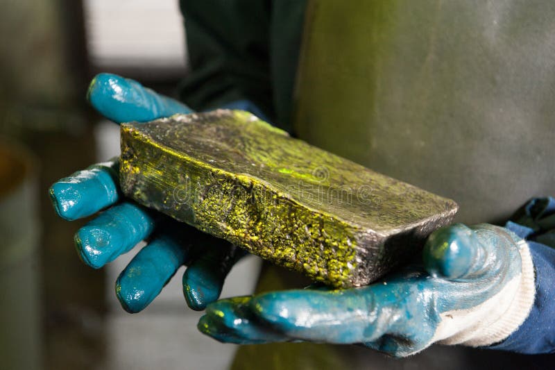 Raw Gold Ingot in the Hands Stock Image - Image of saving, precious ...