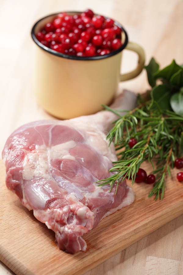 Raw goose leg stock image. Image of berries, poultry - 17816807