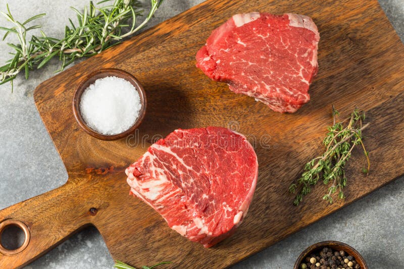 Raw Grass Fed Filet Mignon Steak Stock Image - Image of thyme, pepper ...