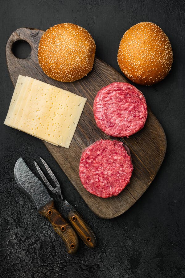 Raw Ground Beef Meat Burger Patties on Black Dark Stone Table ...