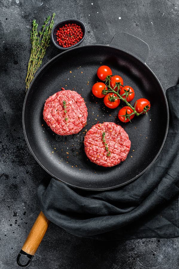 Raw Steak Cutlets or Patty with Mince Ground Beef Meat. Wooden ...