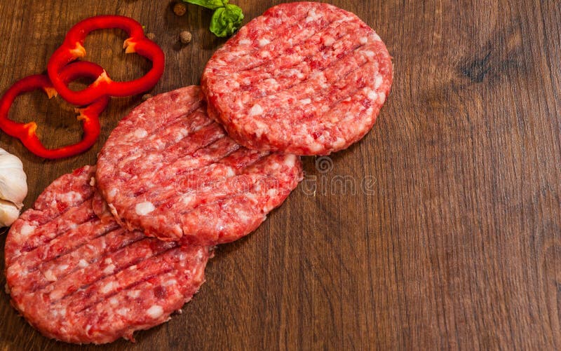 Raw Ground Beef Meat Burger Steak on Wooden Table with Copy Space. Top ...