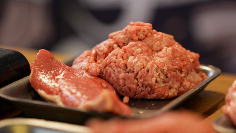 Raw Ground Beef and a Meat Slice in Front Stock Image - Image of pepper ...