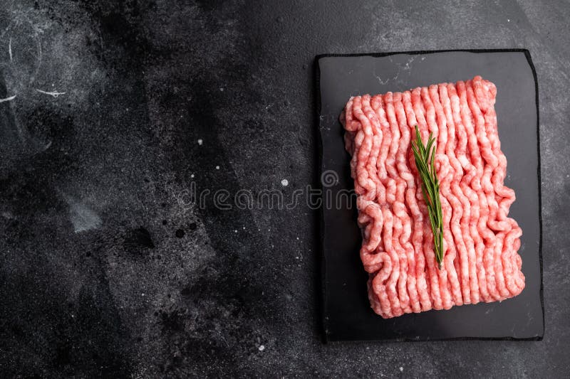 Raw Ground Pork Meat, Mincemeat. Black Background Stock Photo - Image ...