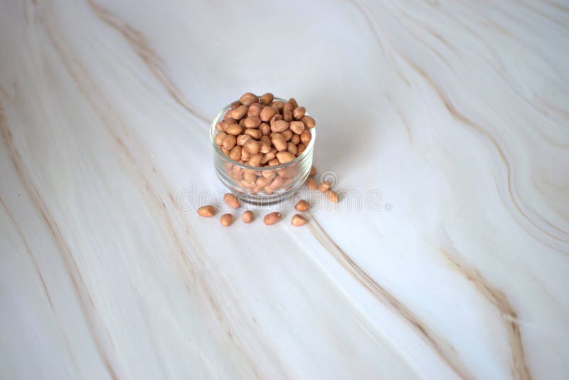 Raw Groundnuts or Peanut Kernel in an Earthen Bowl Stock Photo - Image ...