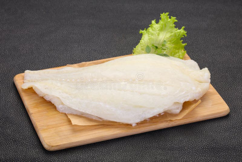 Raw halibut fillet stock image. Image of board, gourmet - 151856205