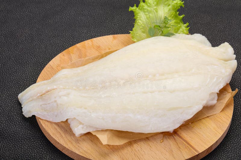 Raw halibut fillet stock photo. Image of isolated, studio - 180415708