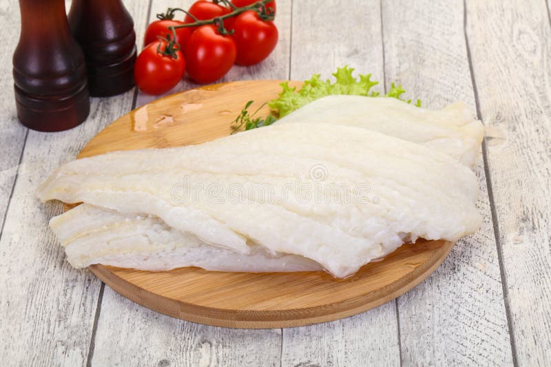Raw halibut fillet stock image. Image of studio, piece - 193401239
