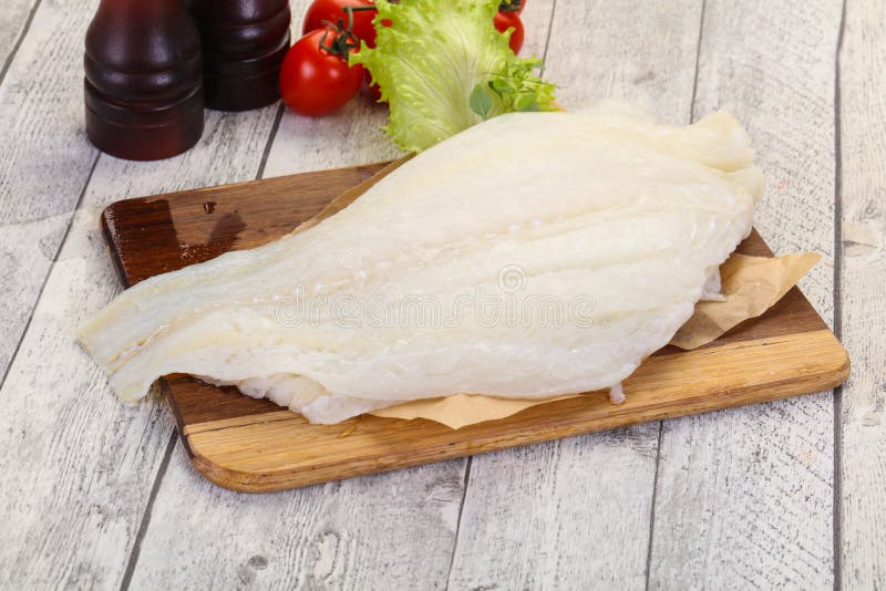 Raw halibut fillet stock photo. Image of healthy, natural - 143451274
