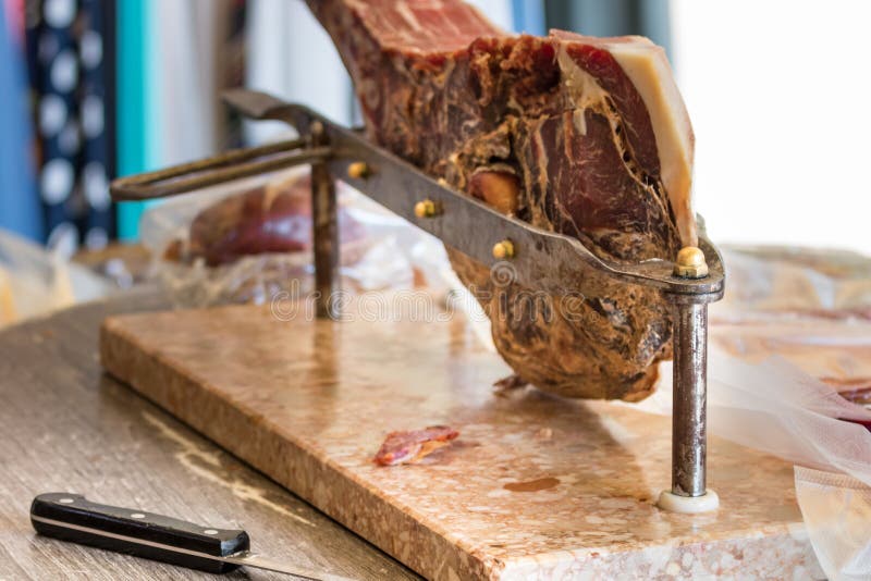 Raw Ham Leg on a Metal Ham Holder in Split, Croatia Stock Photo - Image ...