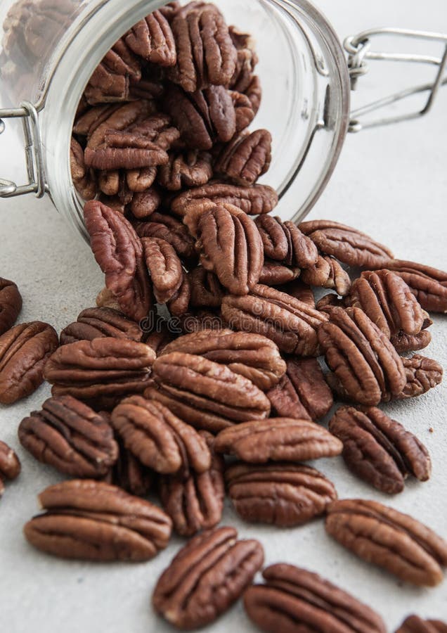 Raw Healthy Pecan Nuts Snack in Glass Jar on White Kitchen Table.Macro ...