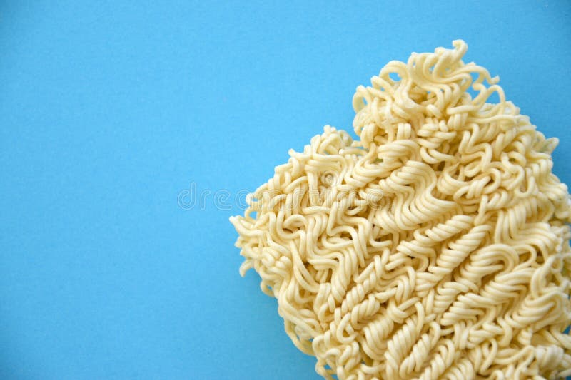 Raw Instant Noodles Blue Paper Background Stock Photos - Free & Royalty ...