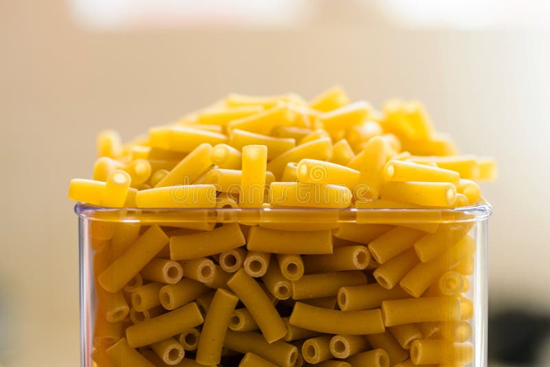 Raw Italian Macaroni Pasta Inside Clear Storage Container Stock Photo ...