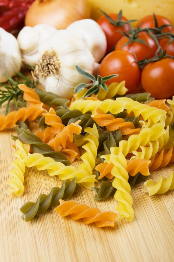 Raw Italian Tricolore Pasta Stock Photo - Image of photograph, pasta ...