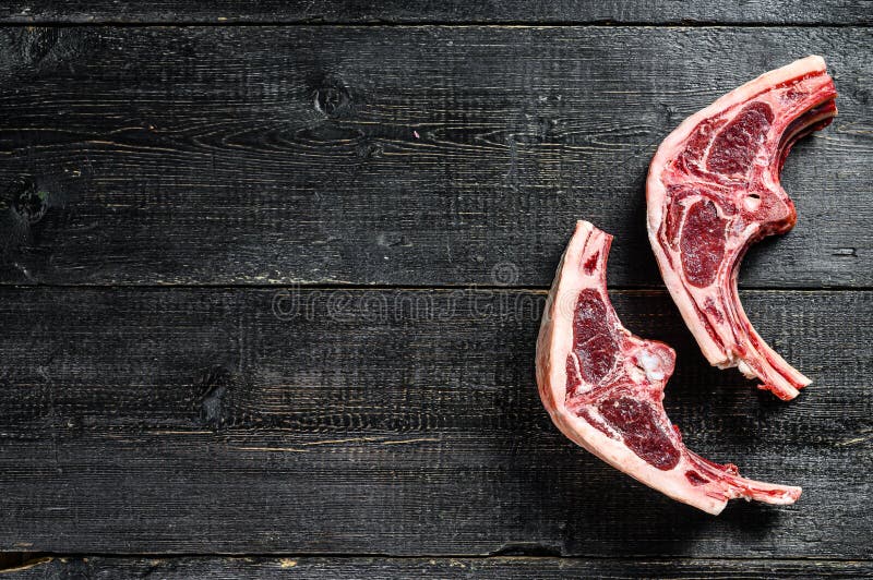 Raw Lamb Chops Fresh Cut . Black Background. Top View Stock Image ...