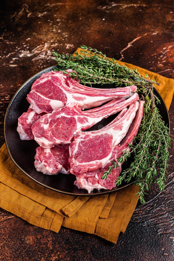 Raw Lamb Chops, Fresh Mutton Meat Cutlets on a Ribs. Dark Background ...