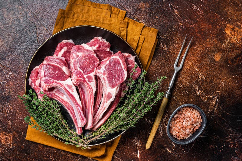 Raw Lamb Chops, Fresh Mutton Meat Cutlets on a Ribs. Dark Background ...