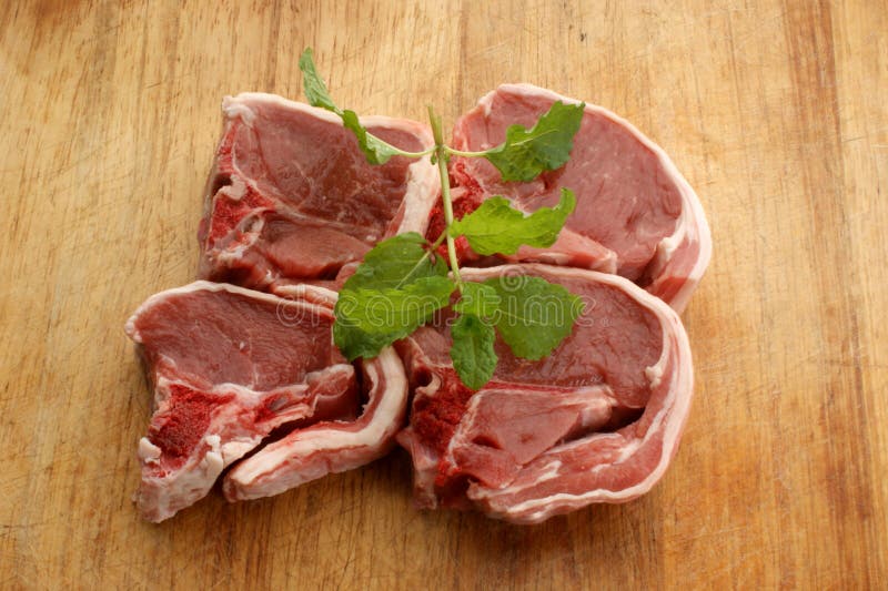 Raw Lamb Chops on a Timber Board Stock Photo - Image of dinner, eating ...