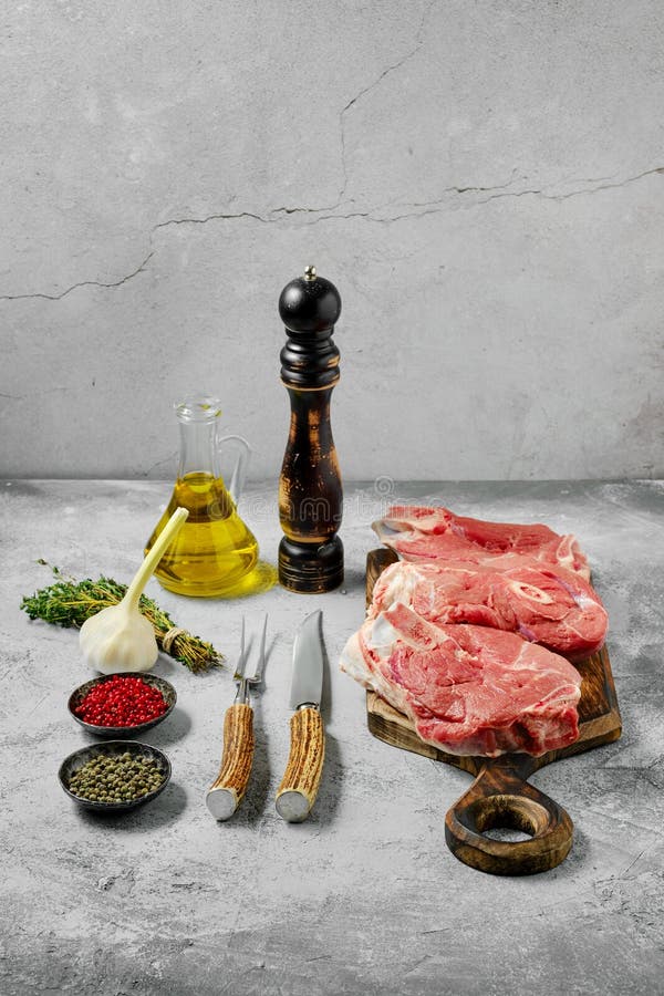 Raw Lamb Leg Steak on Cutting Board Stock Image - Image of board ...