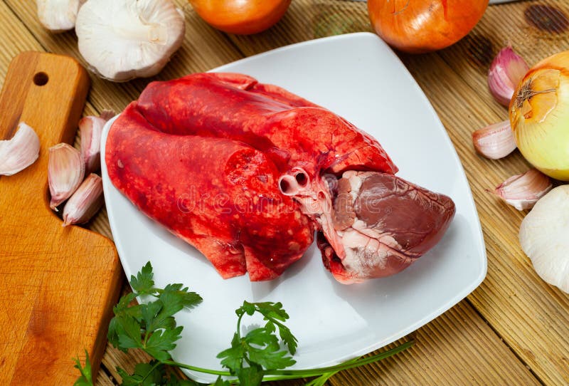 Raw Lamb Lungs and Heart Served with Greens, Nobody Stock Photo - Image ...