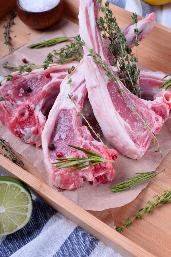 Raw Lamb Ribs, Spices and Herbs on Parchment Stock Photo - Image of ...