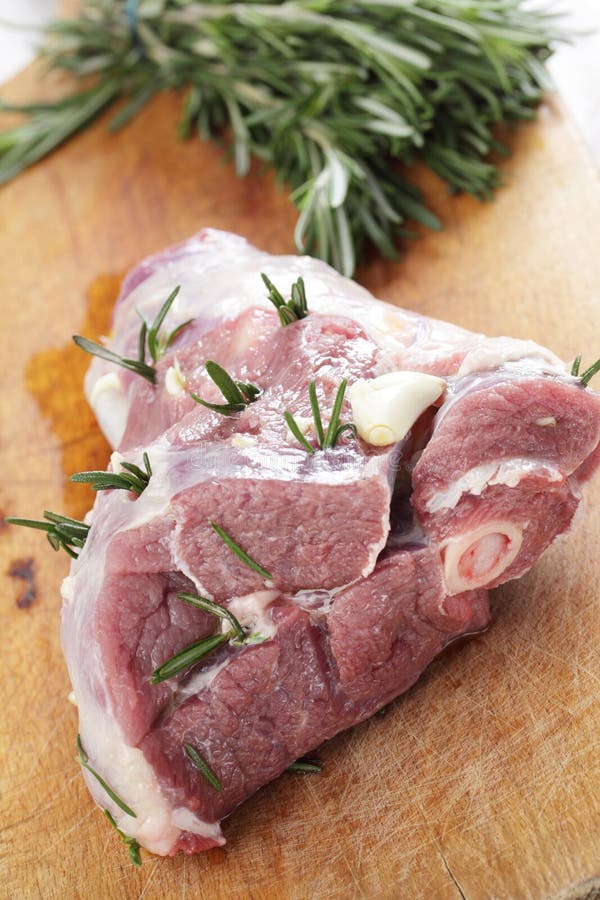 Raw leg of lamb stock photo. Image of garlic, cutting - 17940732