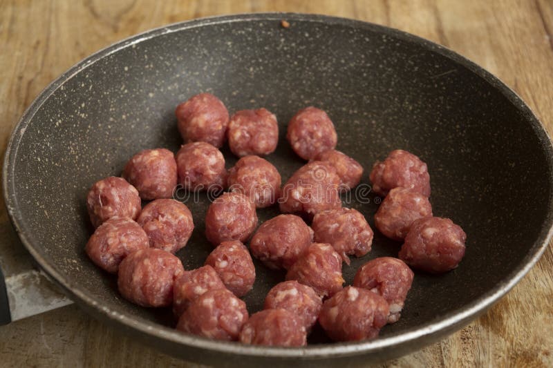 Raw little meatballs stock photo. Image of background - 356110332