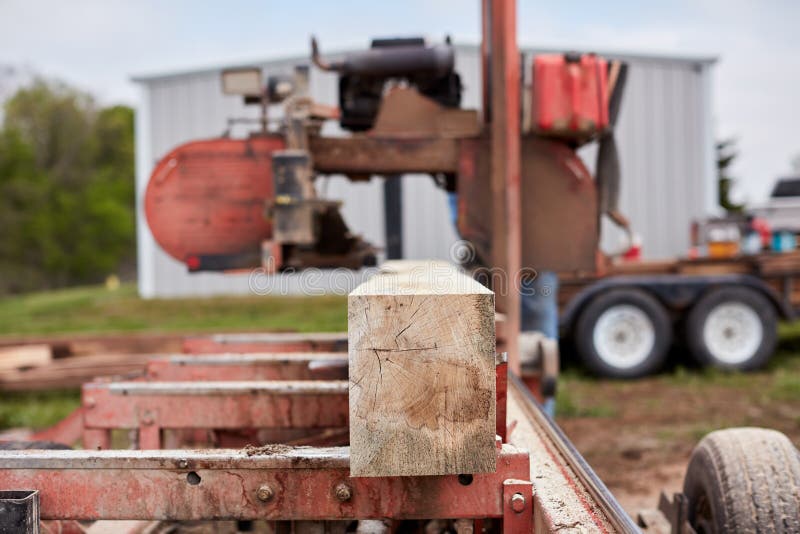 Raw Lumber Being Processed for Planks and Beams Stock Photo - Image of ...