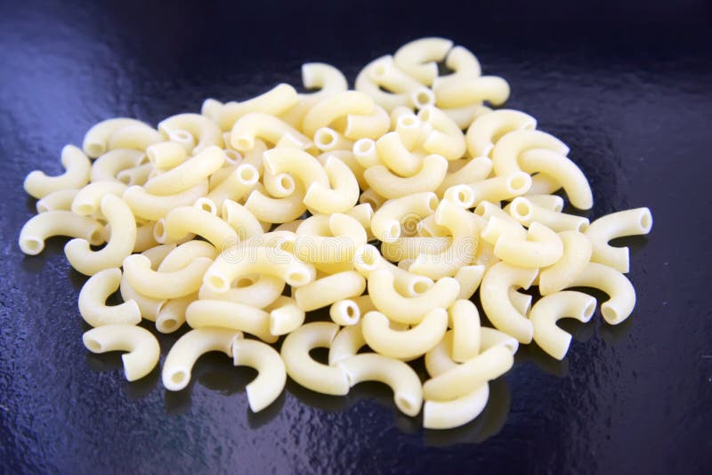 Raw macaroni stock image. Image of shells, pieces, macaroni - 5698375