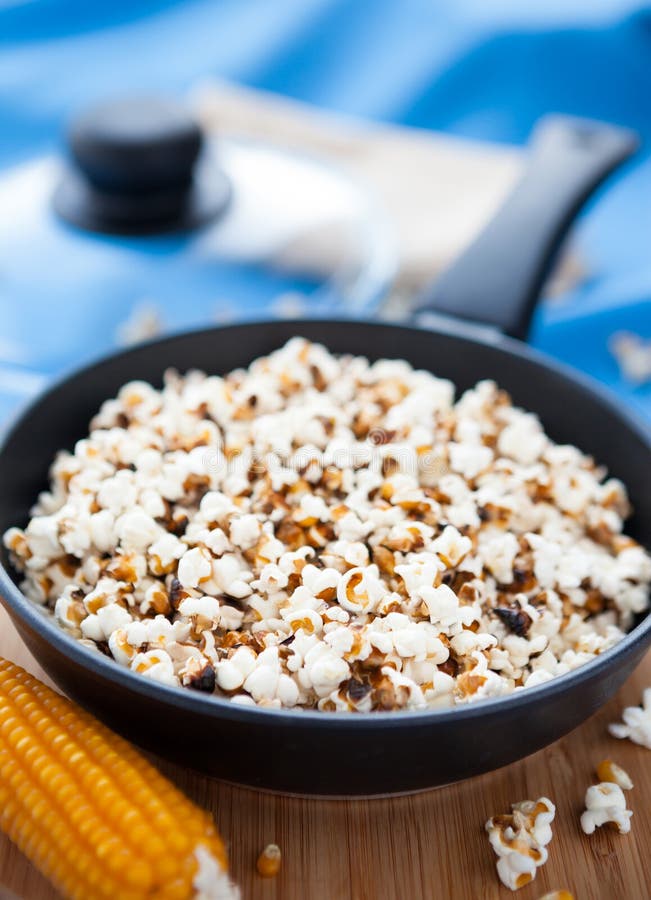 Raw Corn and Popcorn in a Frying Pan Stock Image - Image of caramel ...