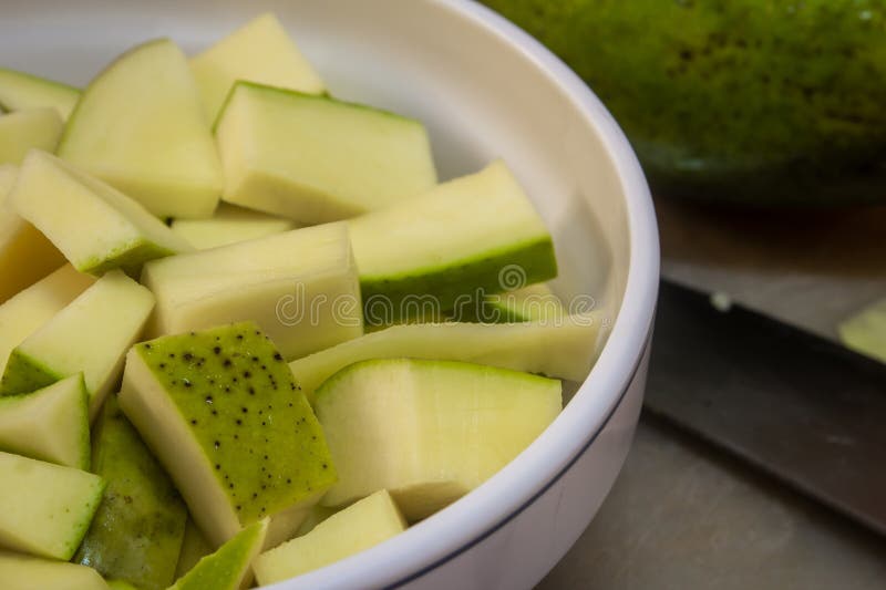 Raw Mango Cut into Small Pieces for Making Salad Stock Image - Image of ...