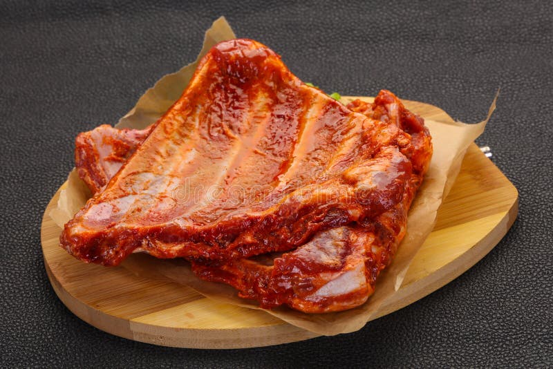 Raw marinated pork ribs stock photo. Image of cooking - 153706466